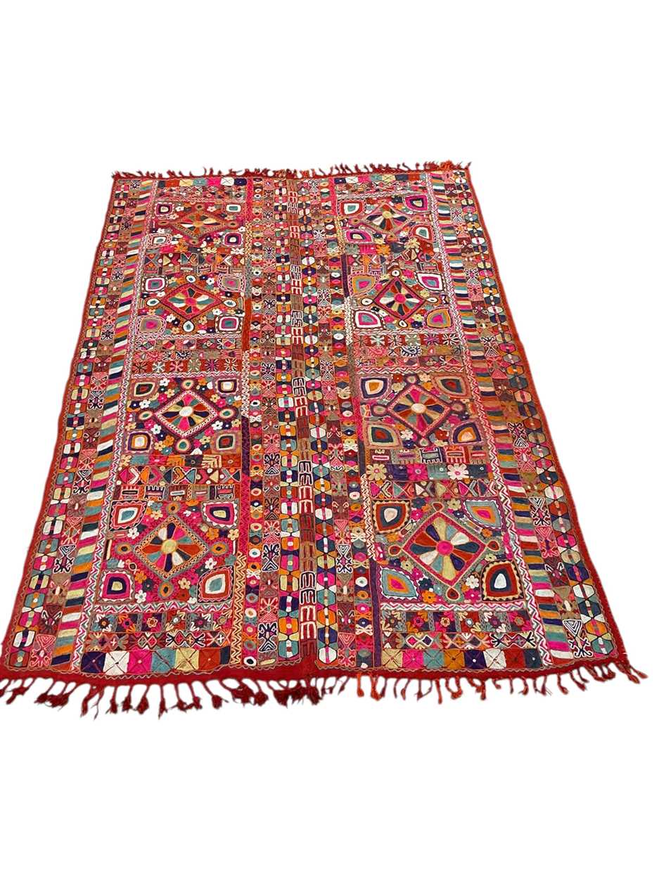 Lot 705 - A mid-century Iraqi crewelwork with bright